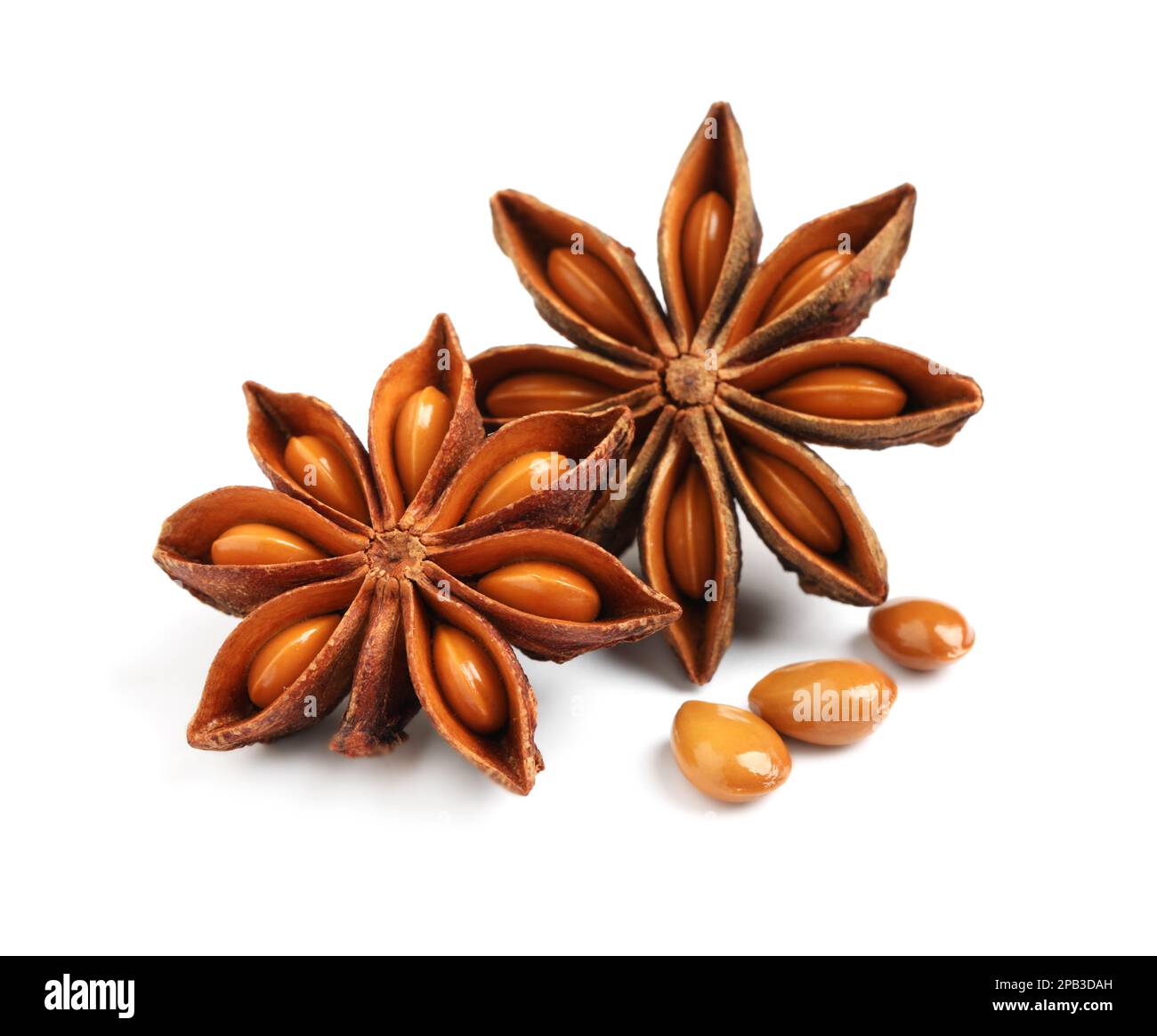 Dry anise stars with seeds on white background Stock Photo - Alamy