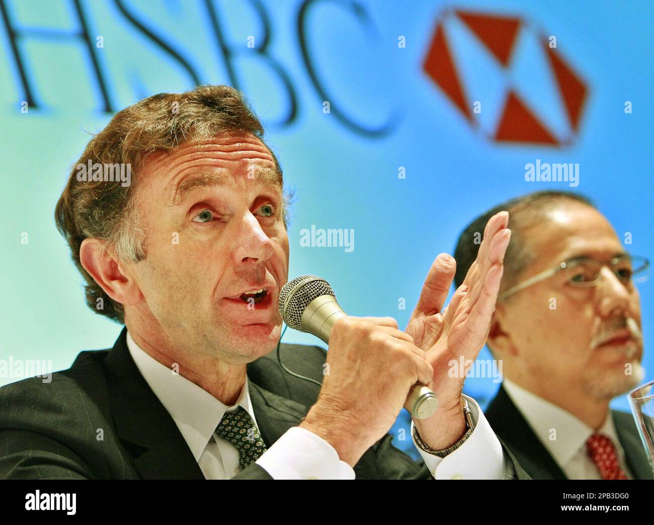 HSBC Holdings PLC Group Chairman Stephen Green, left, speaks about the ...