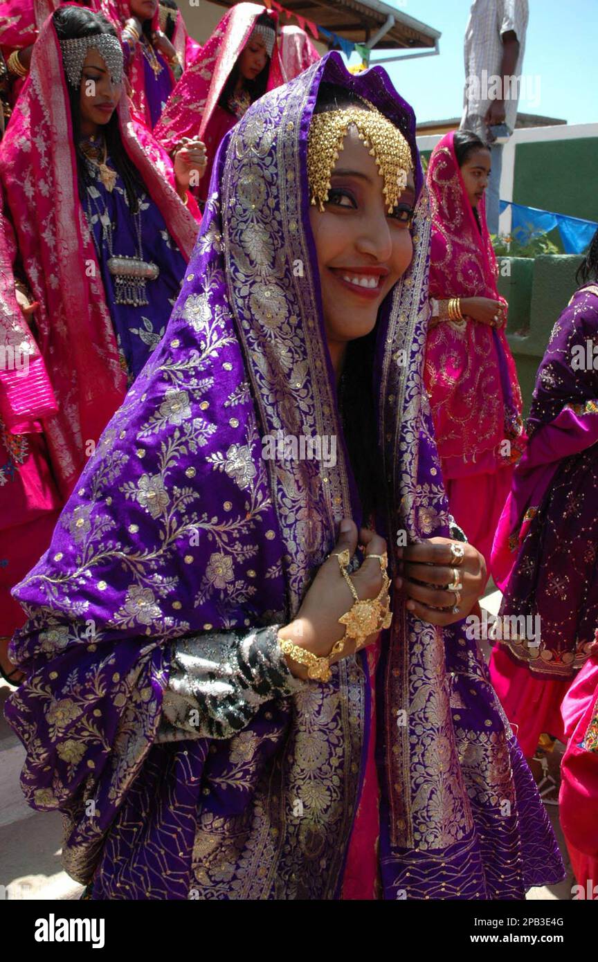 A Harar bride poses before a mass wedding, July 21, 2007 in Harar ...