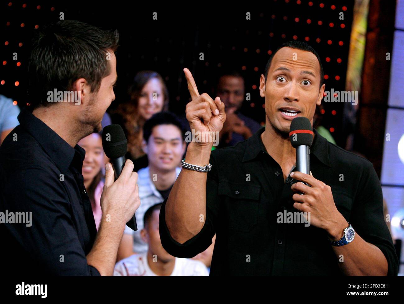 Actor Dwayne "The Rock" Johnson appears onstage during a taping of MTV ...