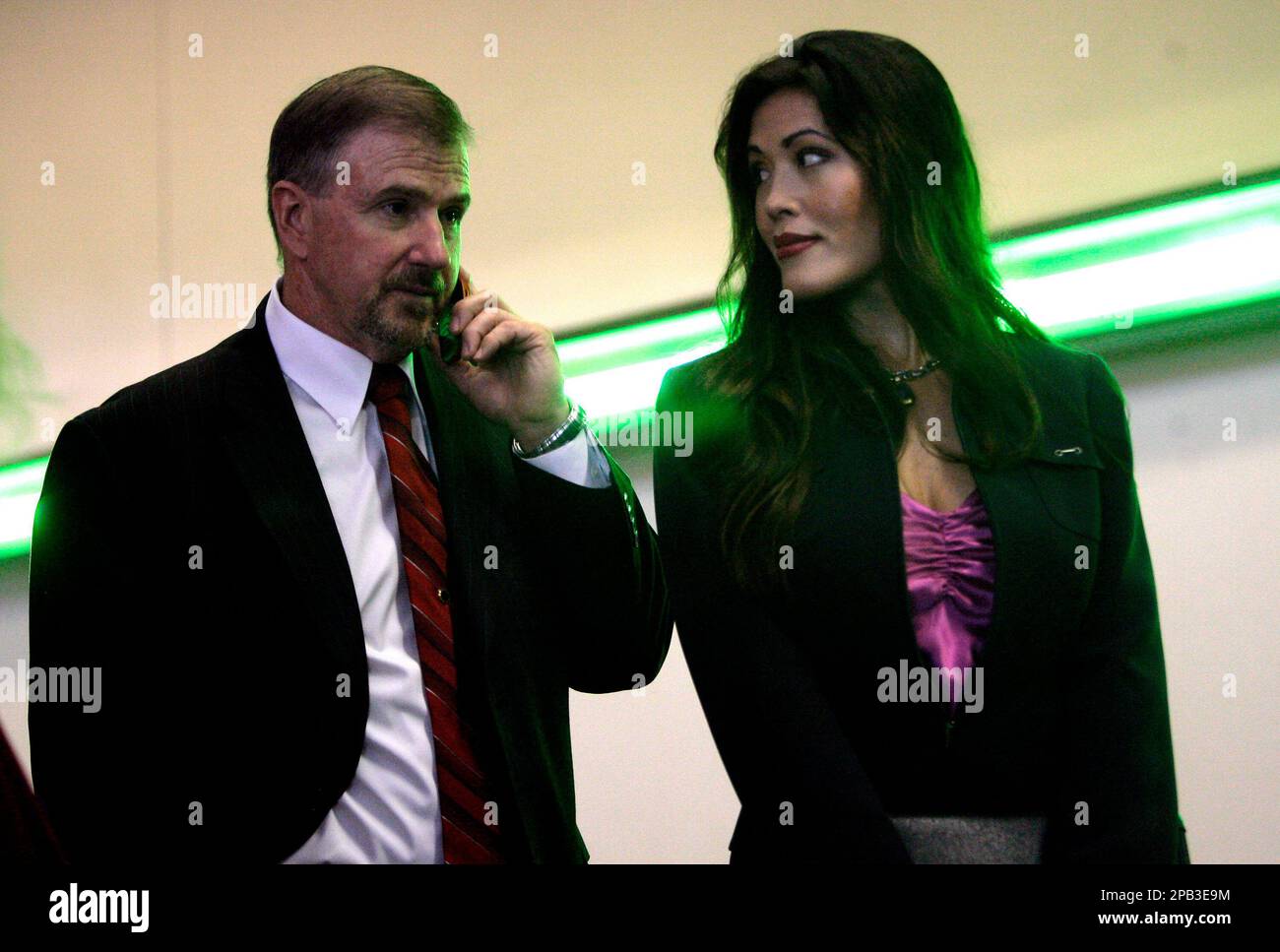 Former Alaska House Speaker Pete Kott, left, stands with his daughter ...