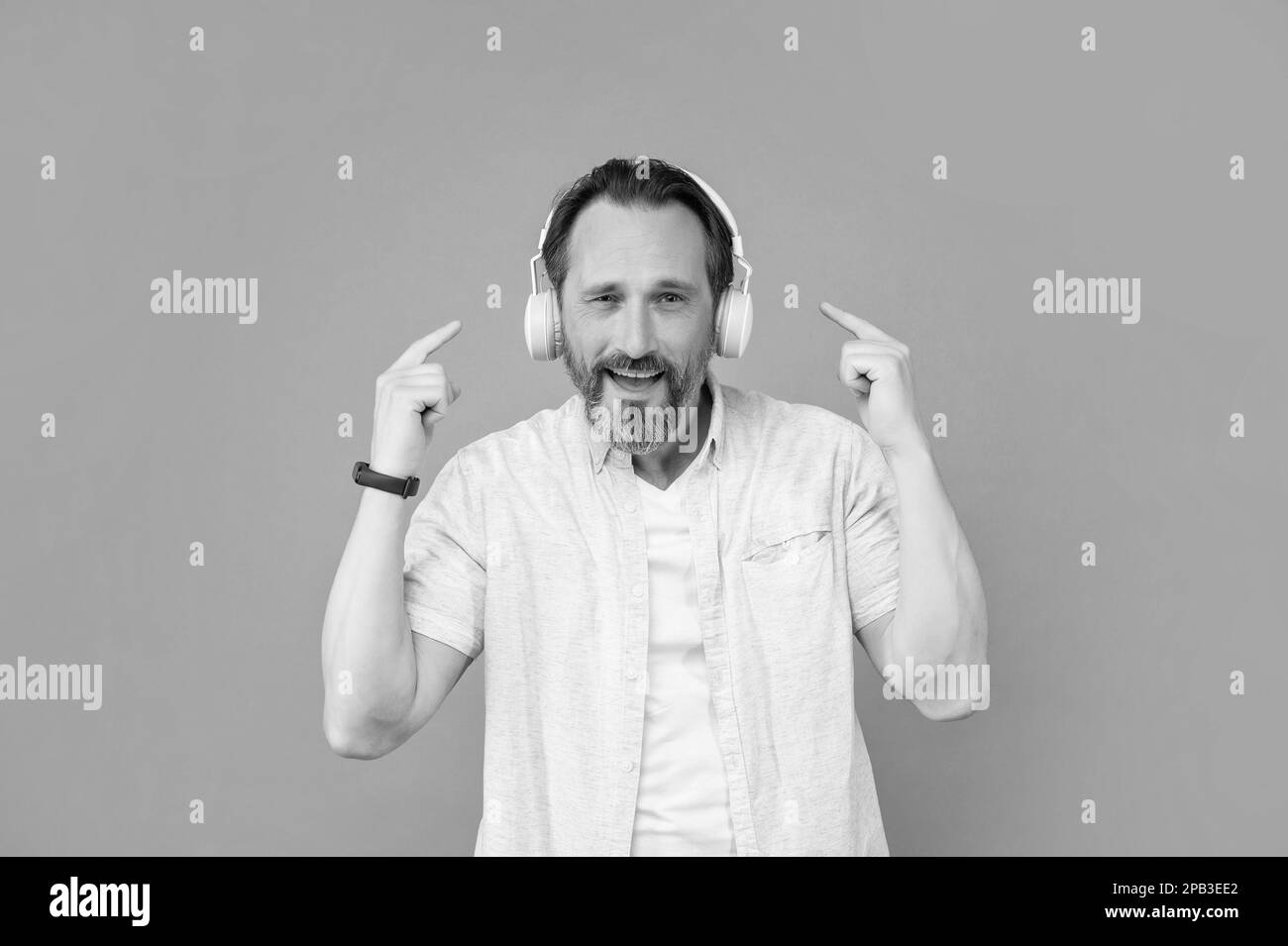 Headphones In Volume Up Happy Old Man Point At Headphones Listening