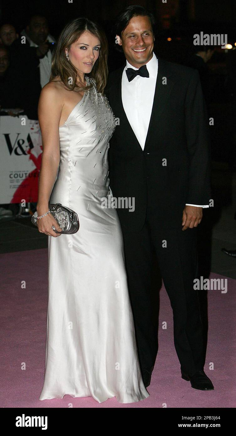 British actress and model Elizabeth Hurley and her husband Arun Nayer ...
