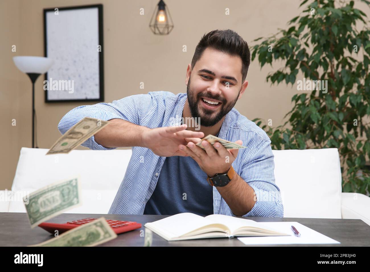Throwing money and man hi-res stock photography and images - Alamy