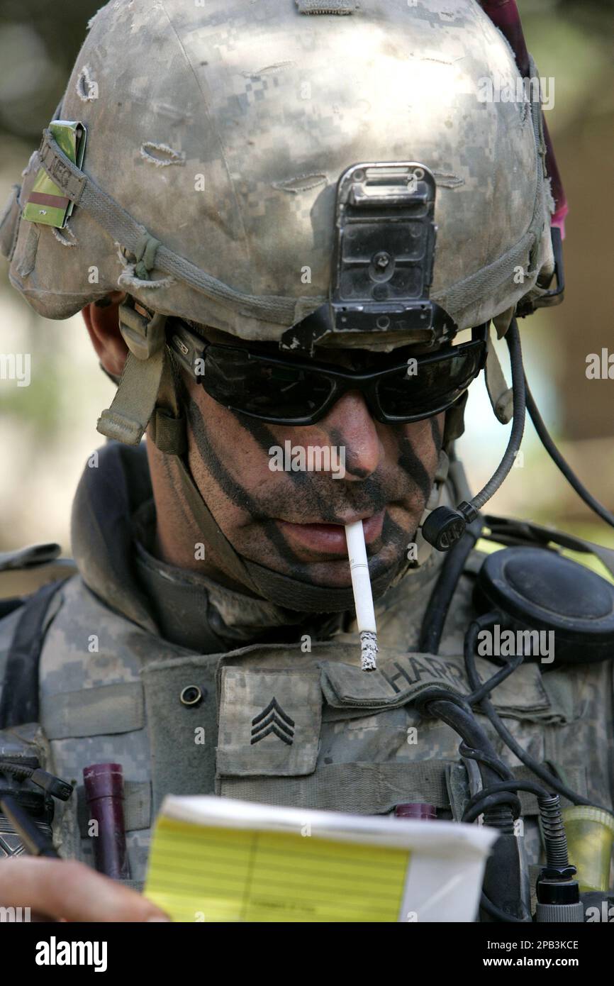 A U.S soldier from Bravo 6-9 Cav. Troop looks at a map during operation ...