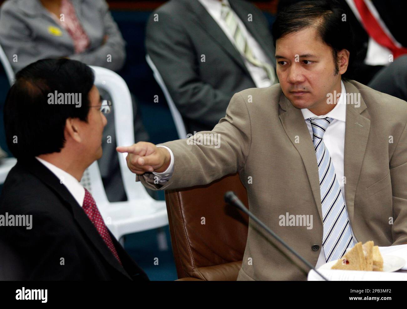 Filipino businessman Joey de Venecia , right, points his finger at Vice ...