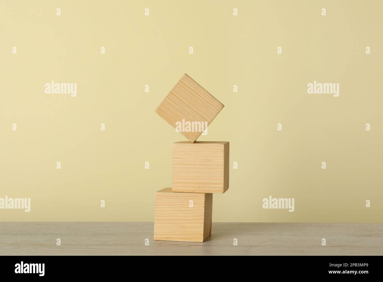 Blocks on edge of table hi-res stock photography and images - Alamy