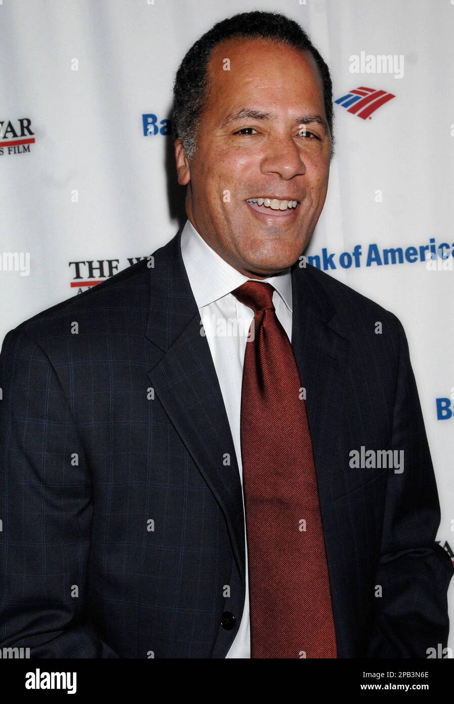 Newscaster Lester Holt arrives for the premiere of the Ken Burns World ...