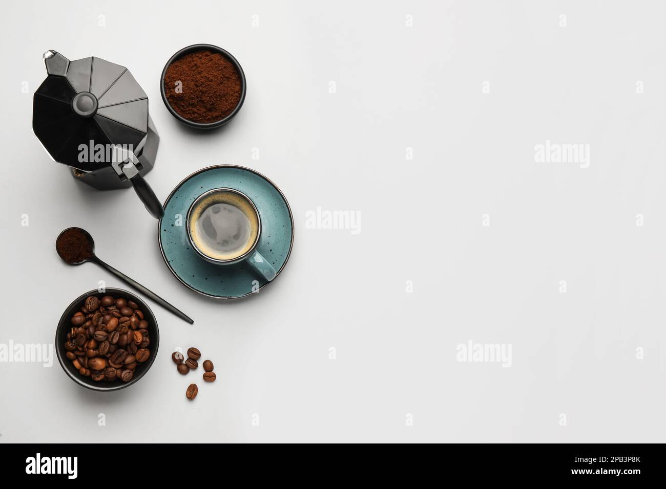 Flat lay composition with coffee grounds and roasted beans on white ...
