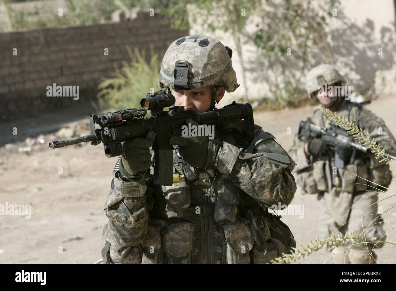 A U.S soldier from Bravo 6-9 Cav. Troop sights through the scope of his ...