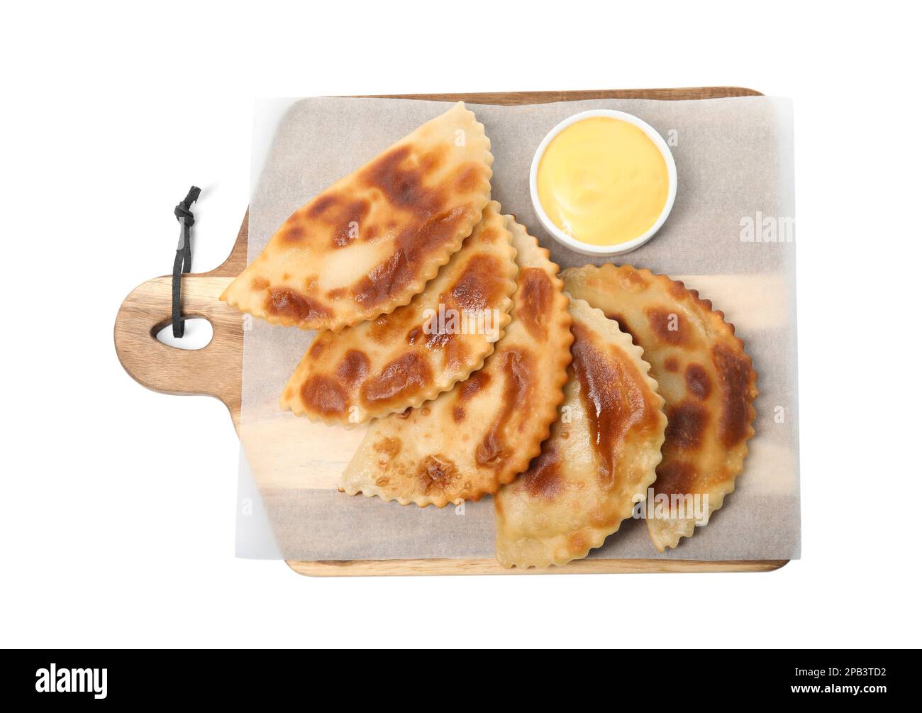 Delicious fried chebureki with sauce isolated on white, top view Stock ...