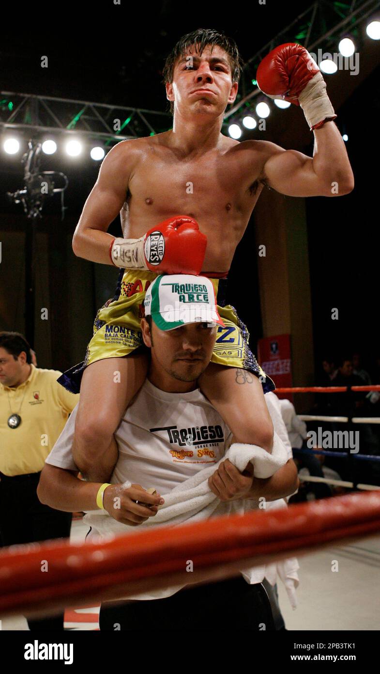 Jorge Arce celebrates his sixth round knockout of Tomas Rojas following ...