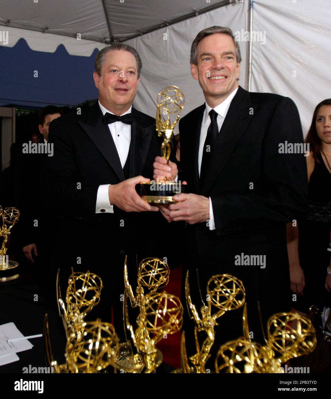 Al Gore, left, and Joel Hyatt hold their outstanding interactive ...