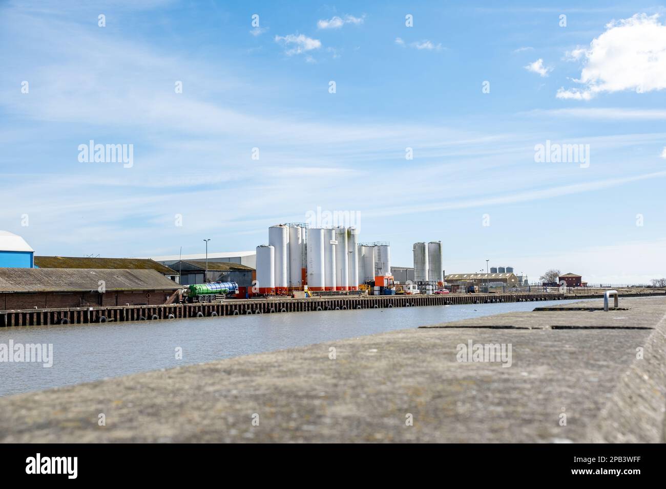 Industrial units on the side of the River Yare docks in the seaside ...