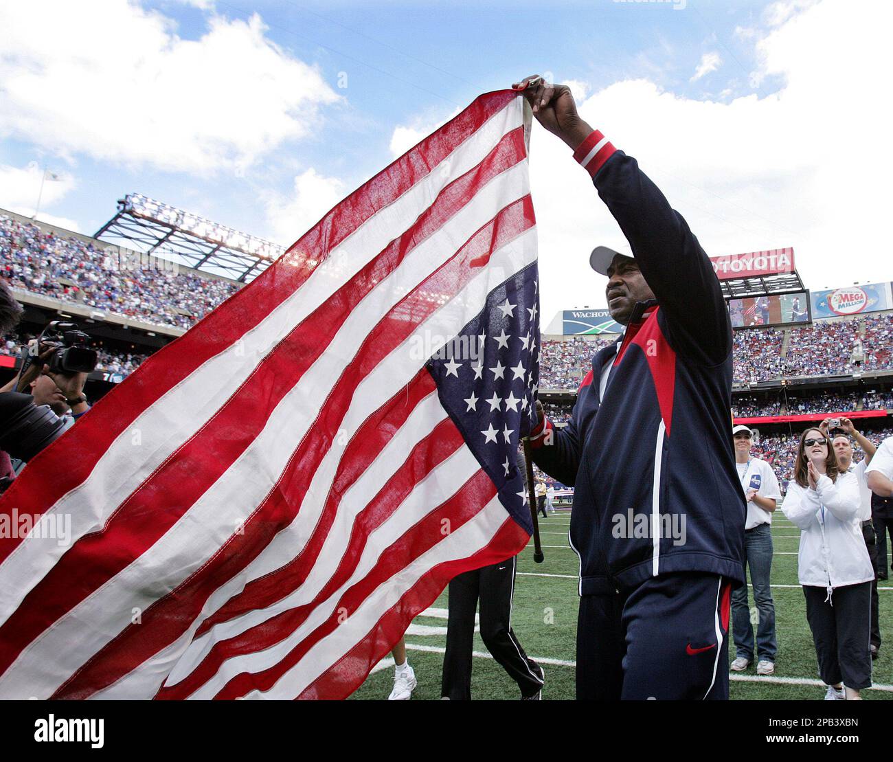 Former New York Giants football star George Martin unfolds an American ...