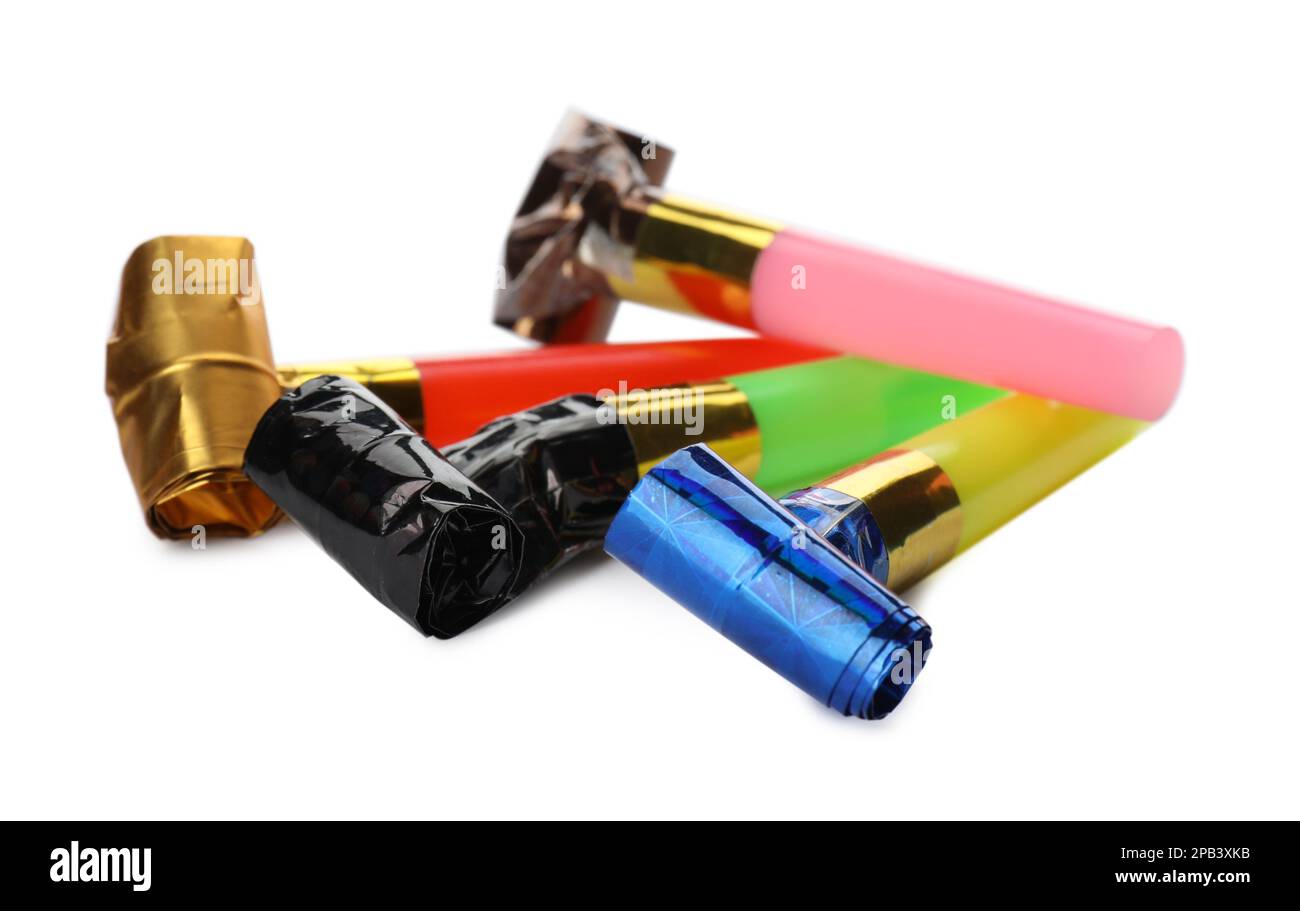 Bright party blowers on white background. Festive items Stock Photo - Alamy