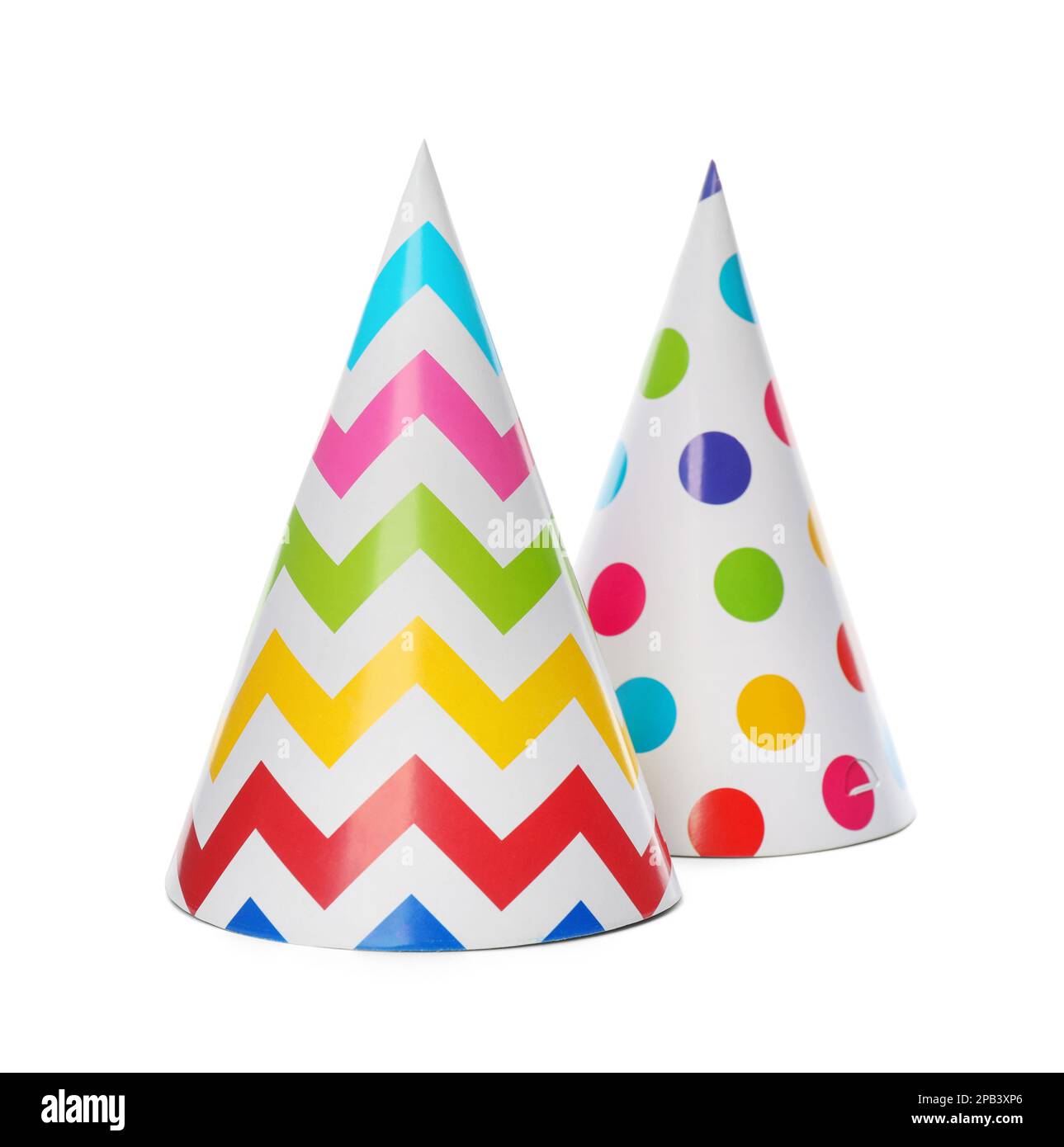 Colorful party hats on white background. Festive items Stock Photo - Alamy