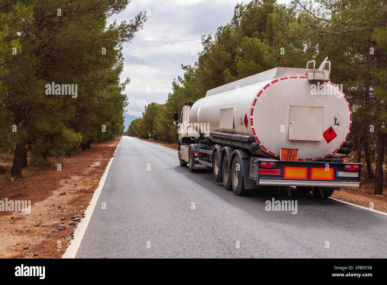 View from the driving position of a truck driving on a narrow road ...