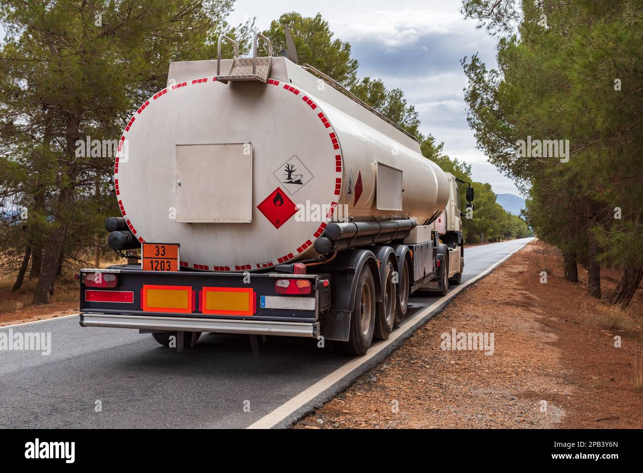 View from the driving position of a truck driving on a narrow road ...