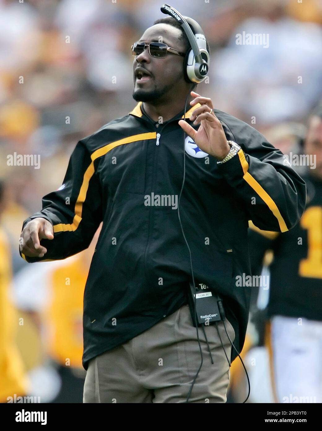 Pittsburgh Steelers coach Mike Tomlin works the sidelines against the ...