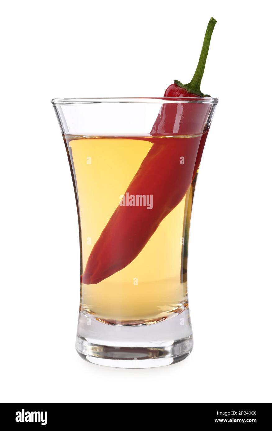 Red hot chili pepper and vodka in shot glass on white background Stock ...