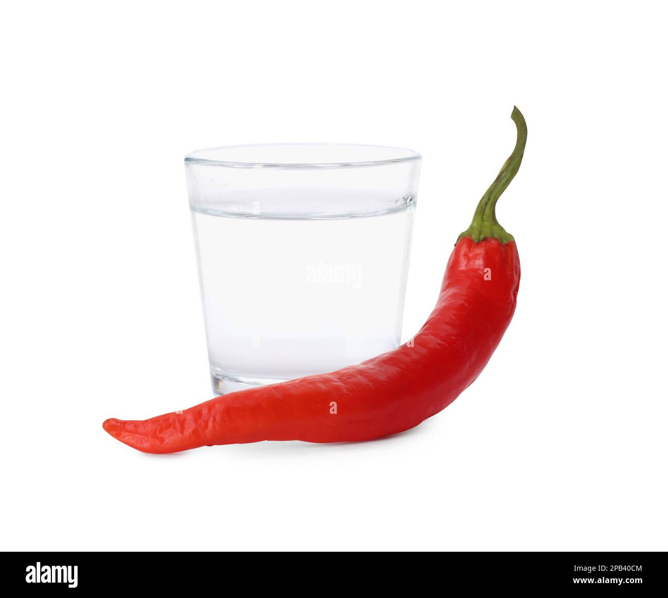 Red hot chili pepper and vodka in shot glass on white background Stock ...