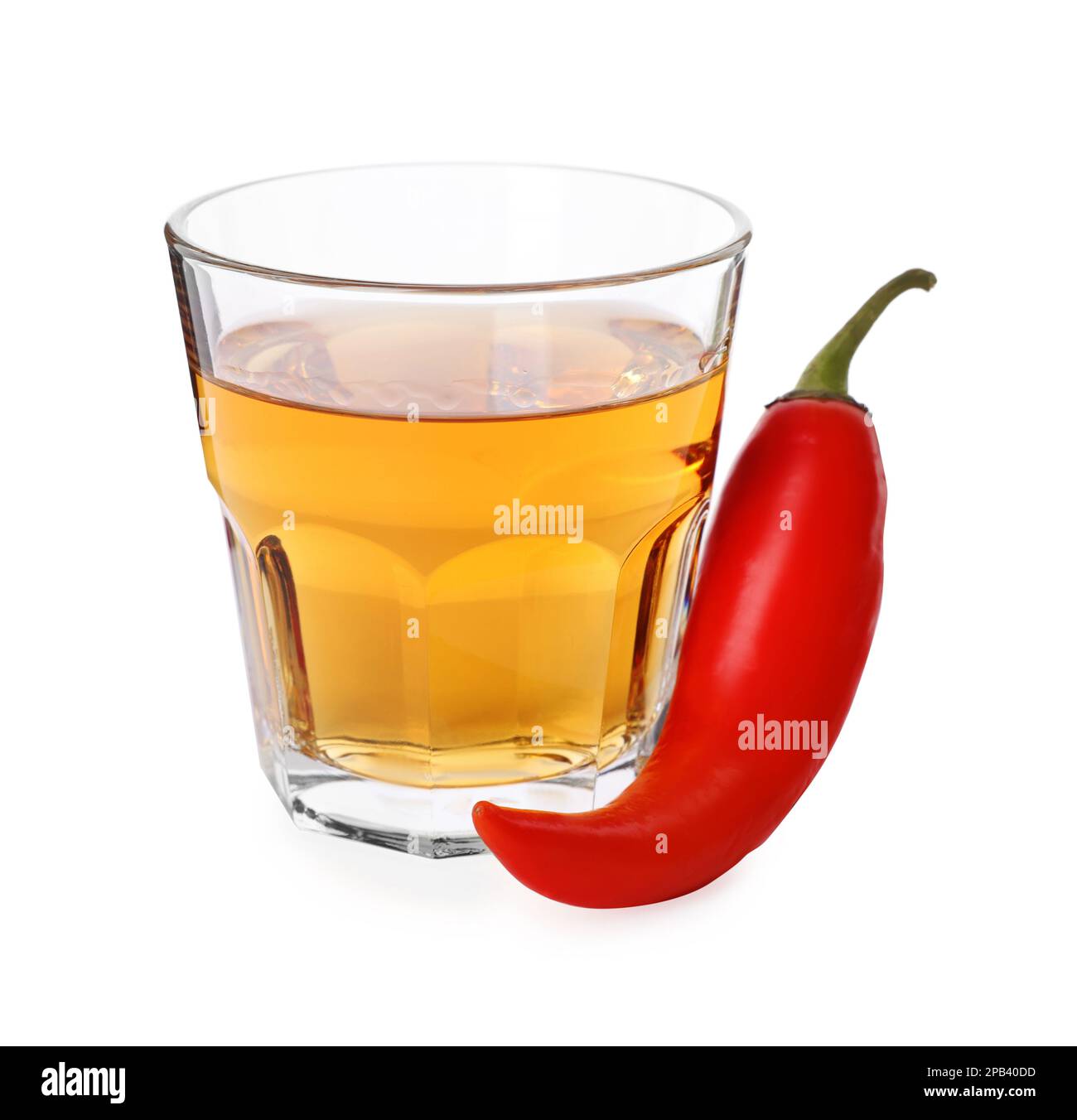 Red hot chili pepper and vodka in glass on white background Stock Photo ...