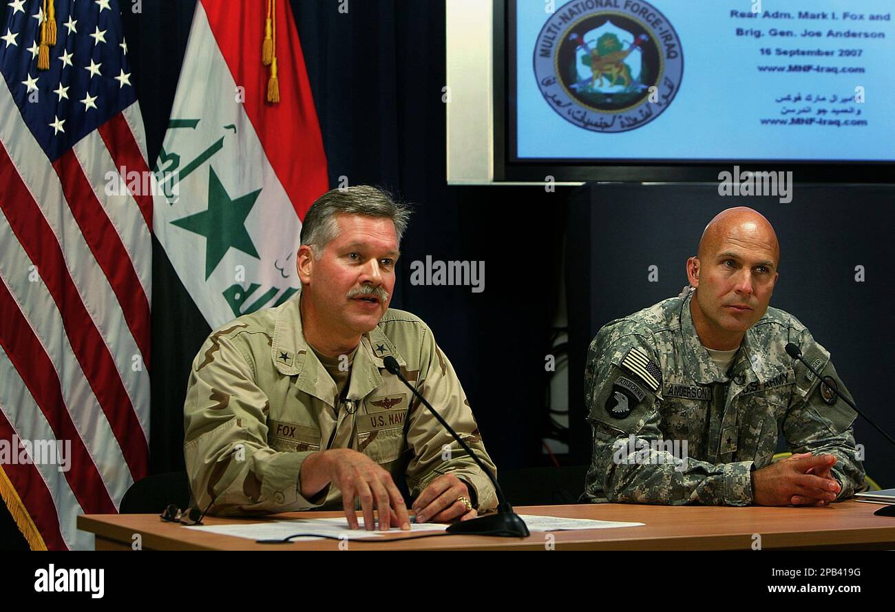 Rear Adm. Mark I. Fox, left, Communications Division chief for Multi ...