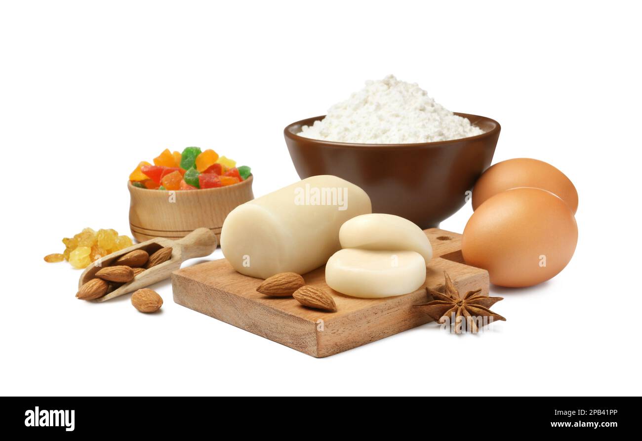 Marzipan and other ingredients for homemade Stollen on white background ...