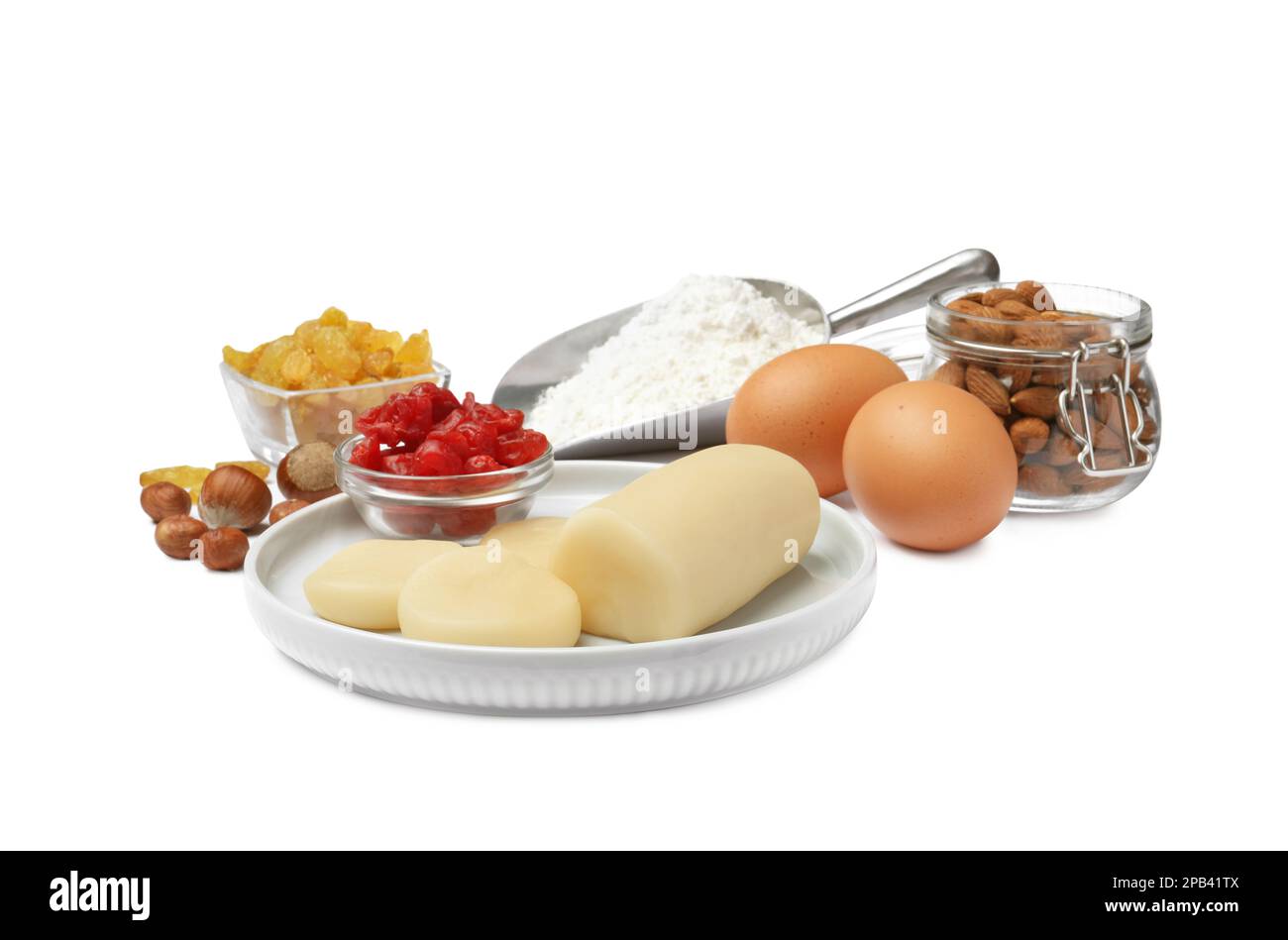 Marzipan and other ingredients for homemade Stollen on white background ...