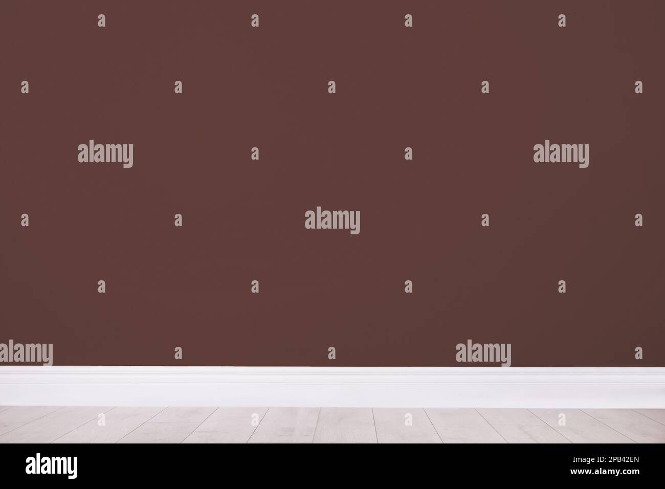 Blank brown wall in room. Space for design Stock Photo - Alamy