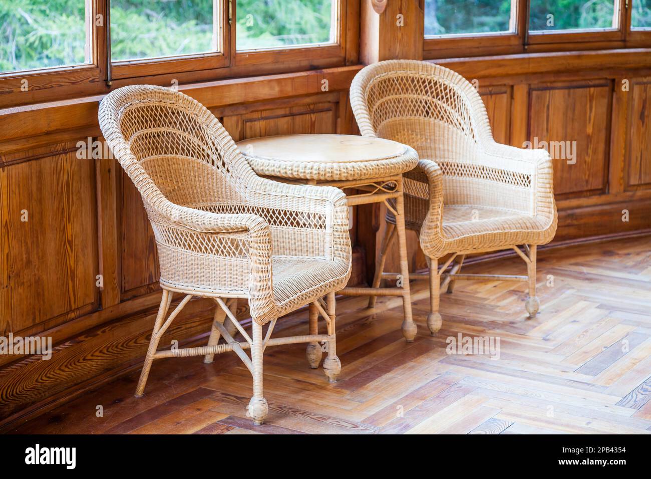 This couple of Italian wickler chairs with table are part of the ...