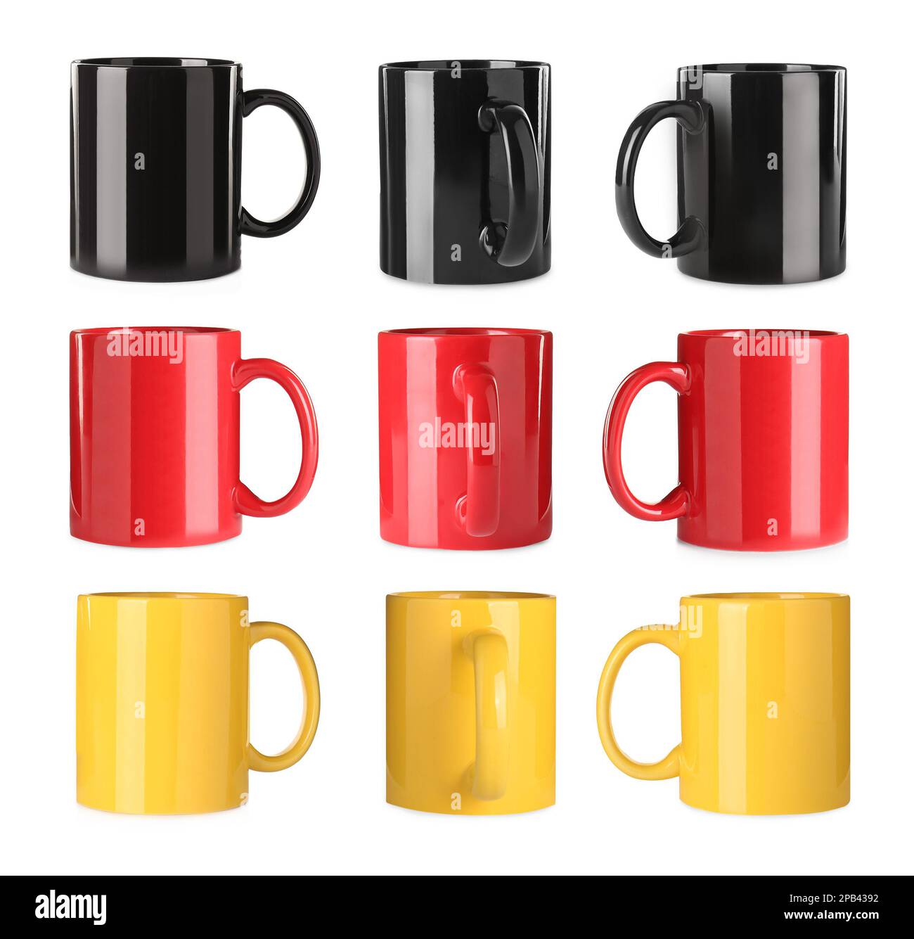 Set with different ceramic mugs on white background Stock Photo - Alamy