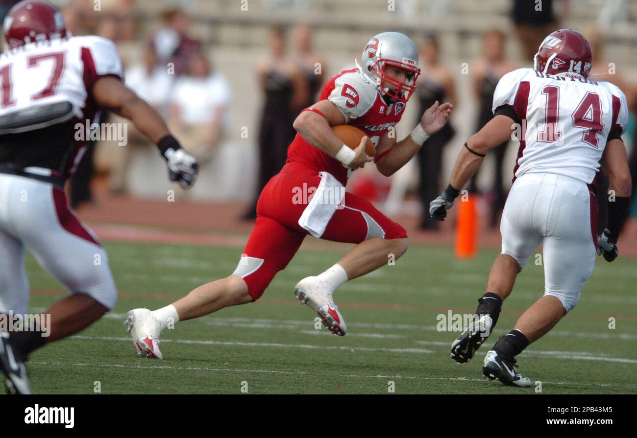 Western Kentucky quarterback David Wolke scrambles past Eastern ...