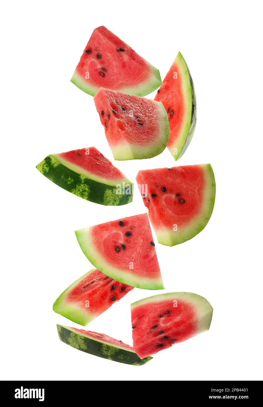Slices of delicious ripe watermelon falling on white background Stock ...