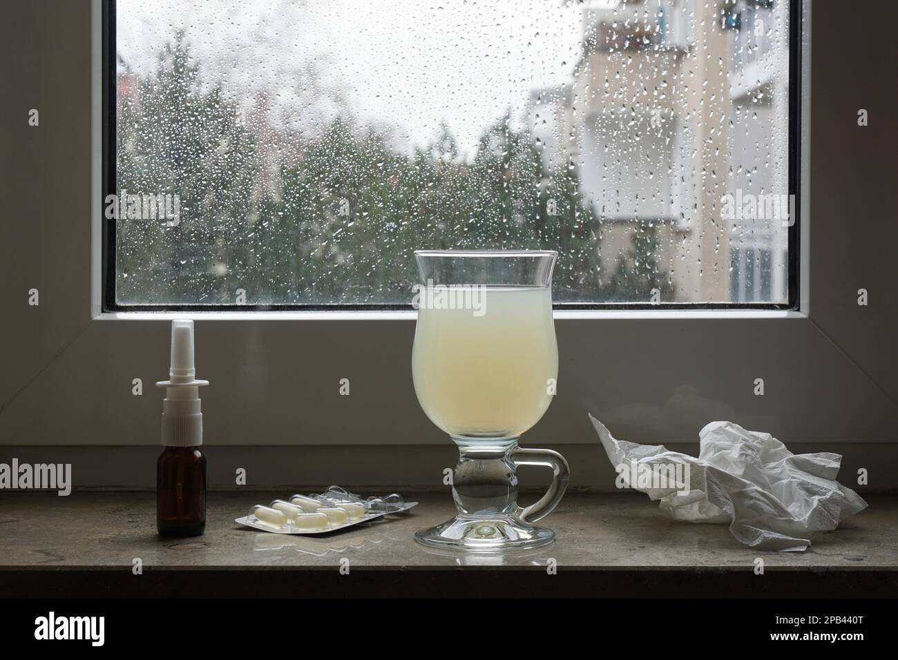 common cold or flu remedy. hot lemonade, nasal spray, pills, and ...