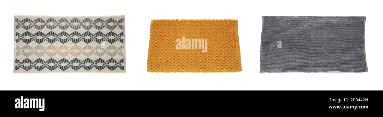 Set with soft bath mats on white background, top view. Banner design ...