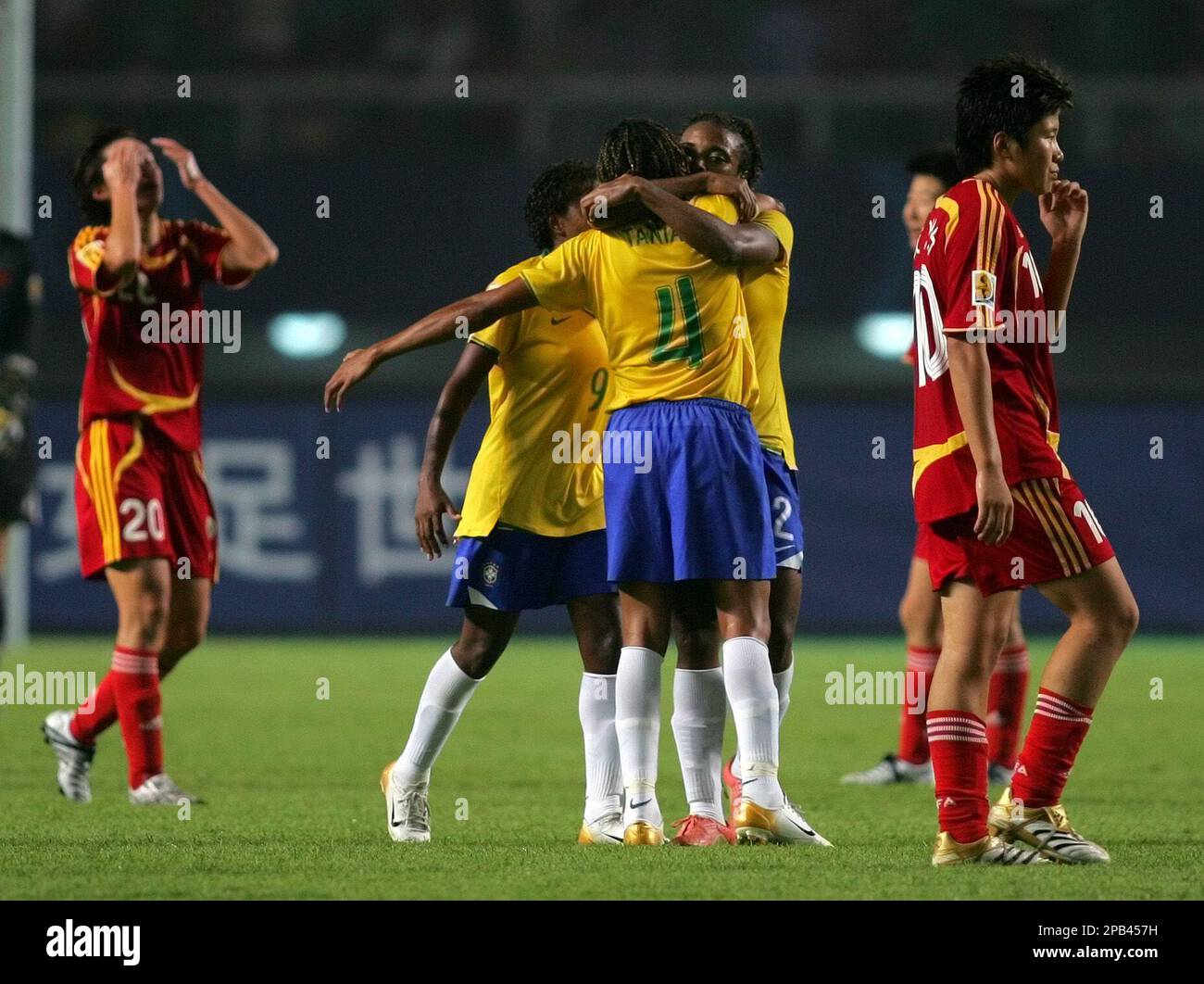 Brazilian players celebrate after their 4-0 win over China in their ...