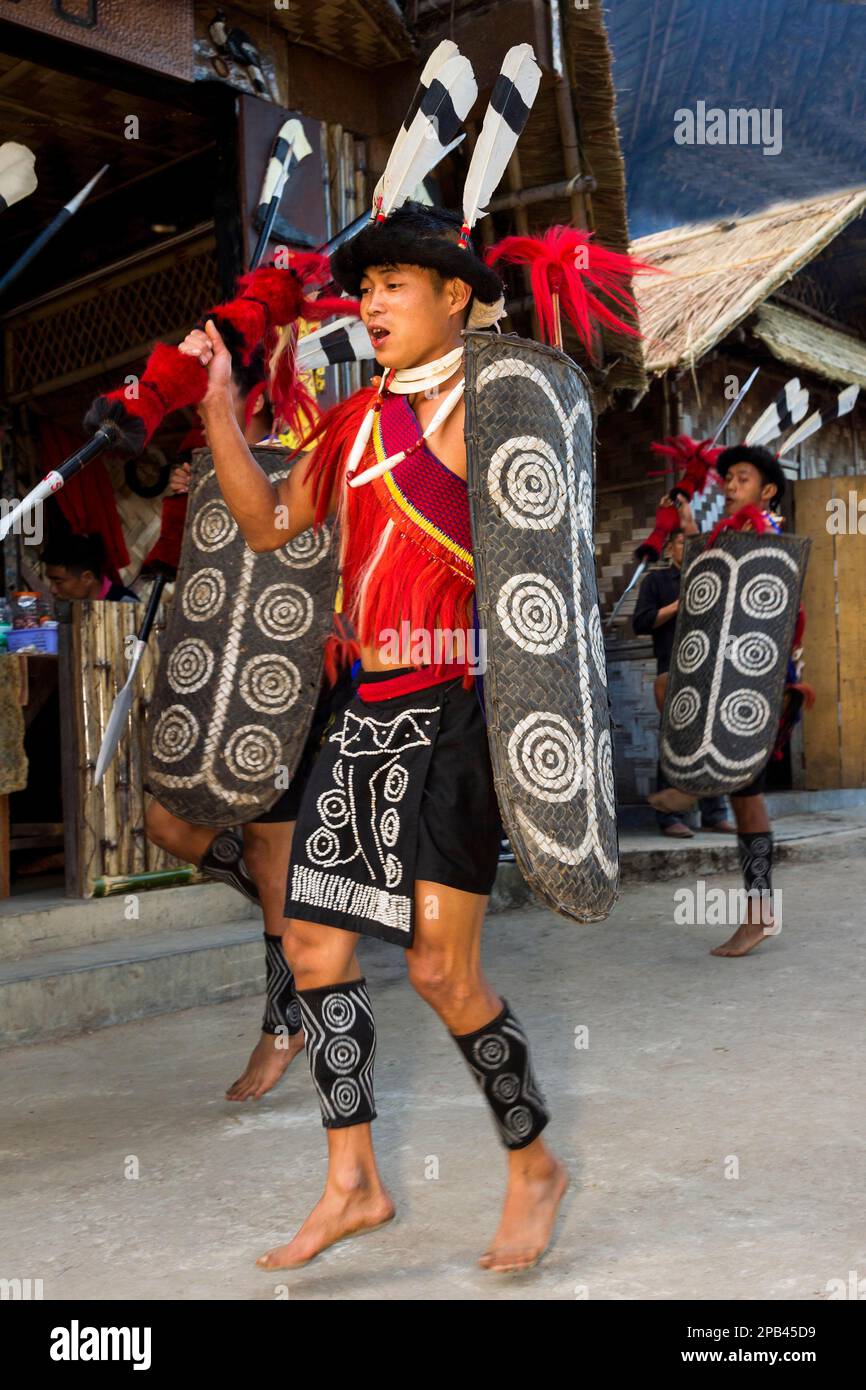 Naga tribesman at a parade in traditional dress, Kisima Nagaland Hornbill Festival, Kohima ...