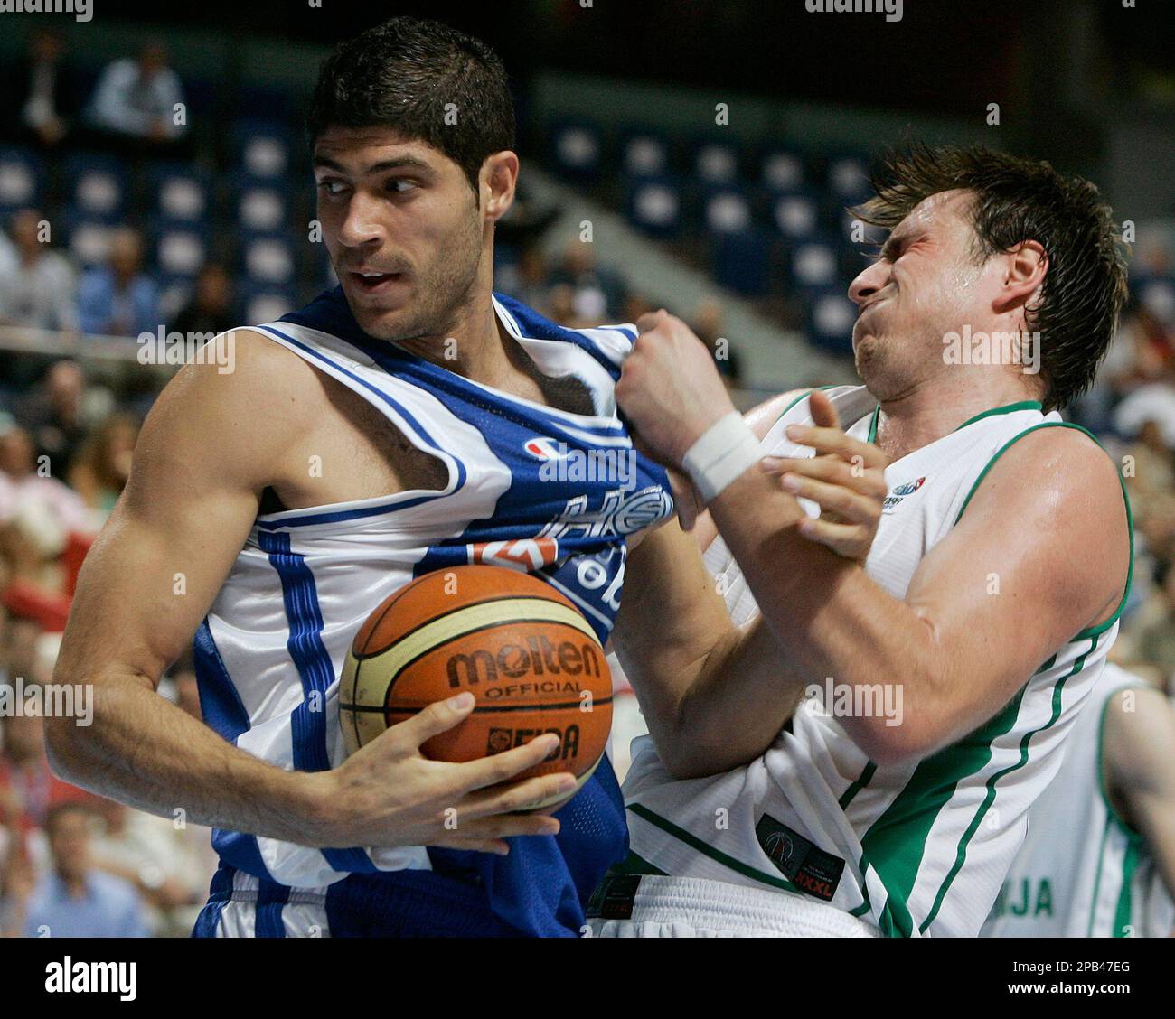 Greece national basketball team player Michalis Pelekanos, left, fights ...