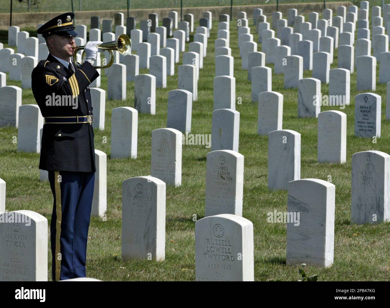 SSGT. David Johnson plays a "ceremonial" bugle Friday, Sept. 14, 2007 ...