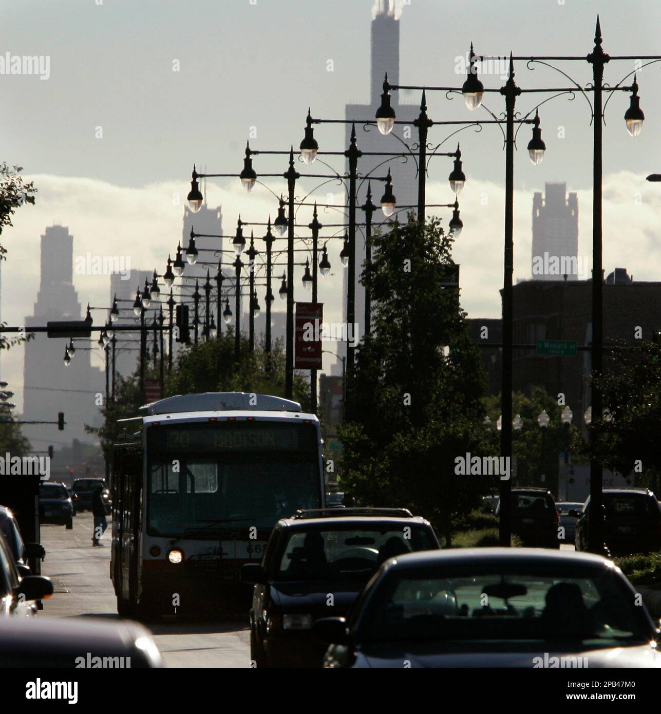 With the Chicago skyline as a backdrop, a Chicago Transit Authority bus ...