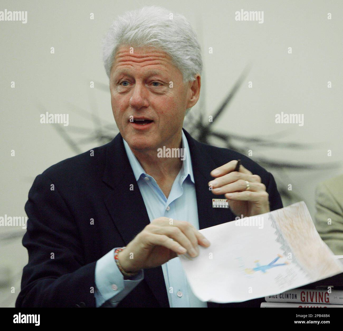Former President Bill Clinton looks to return a child's drawing after ...