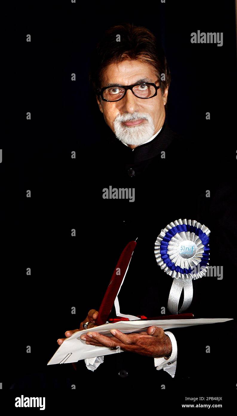Bollywood actor Amitabh Bachchan reacts after receiving the Best Actor ...