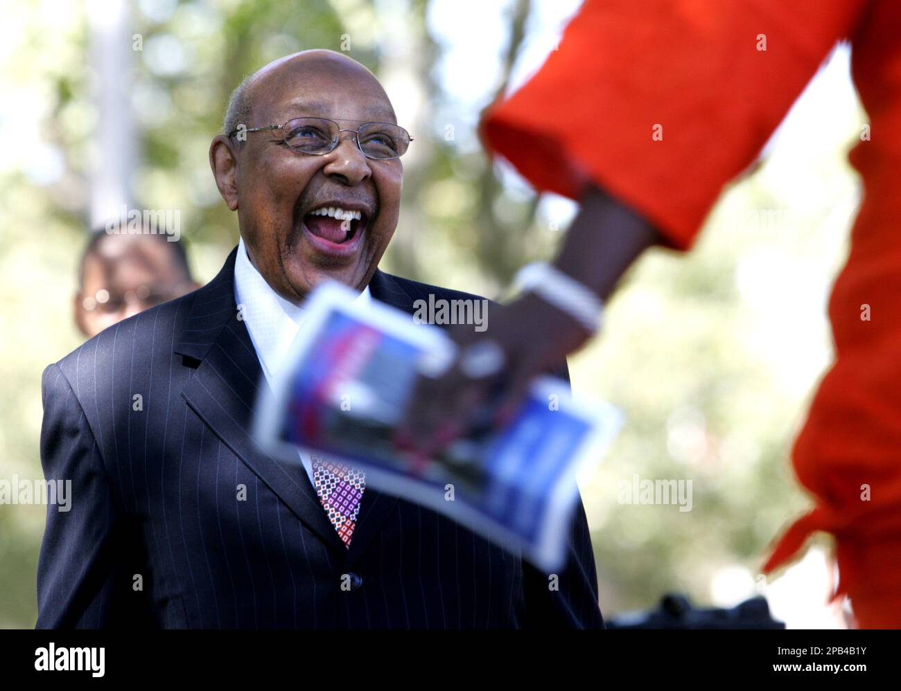 Former congressman Louis Stokes laughs as he is surprised to see Ohio ...