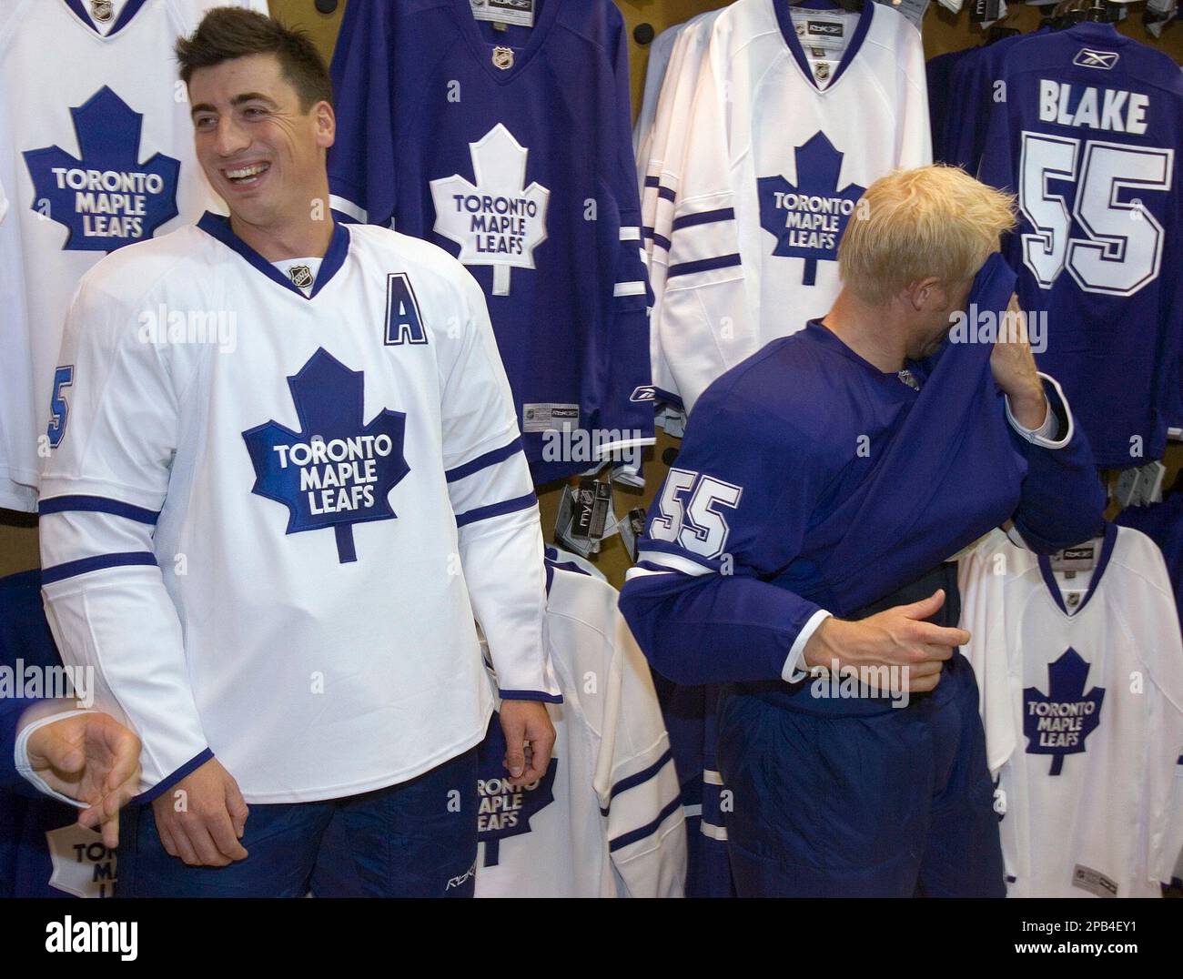 Toronto Maple Leafs' Tomas Kaberle, left, of the Czech Republic, laughs ...