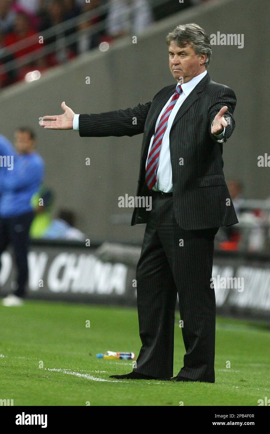 Russian coach Guus Hiddink makes a point to his team during their Euro ...
