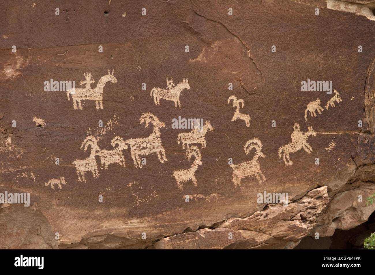 Ute Rock Art, Native American petroglyphs in sandstone rock, showing ...