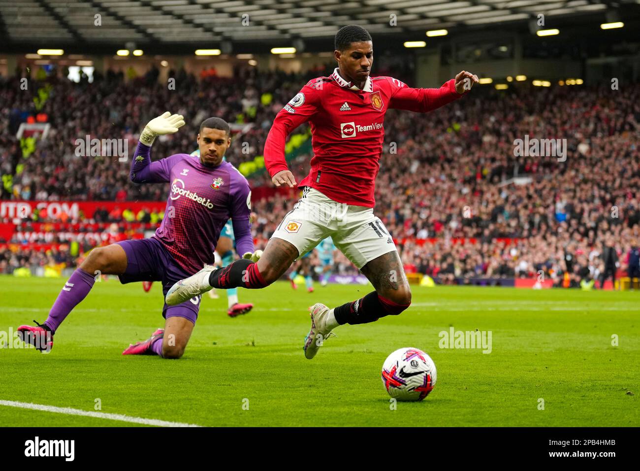 Southampton's goalkeeper Gavin Bazunu, left, and Manchester United's ...