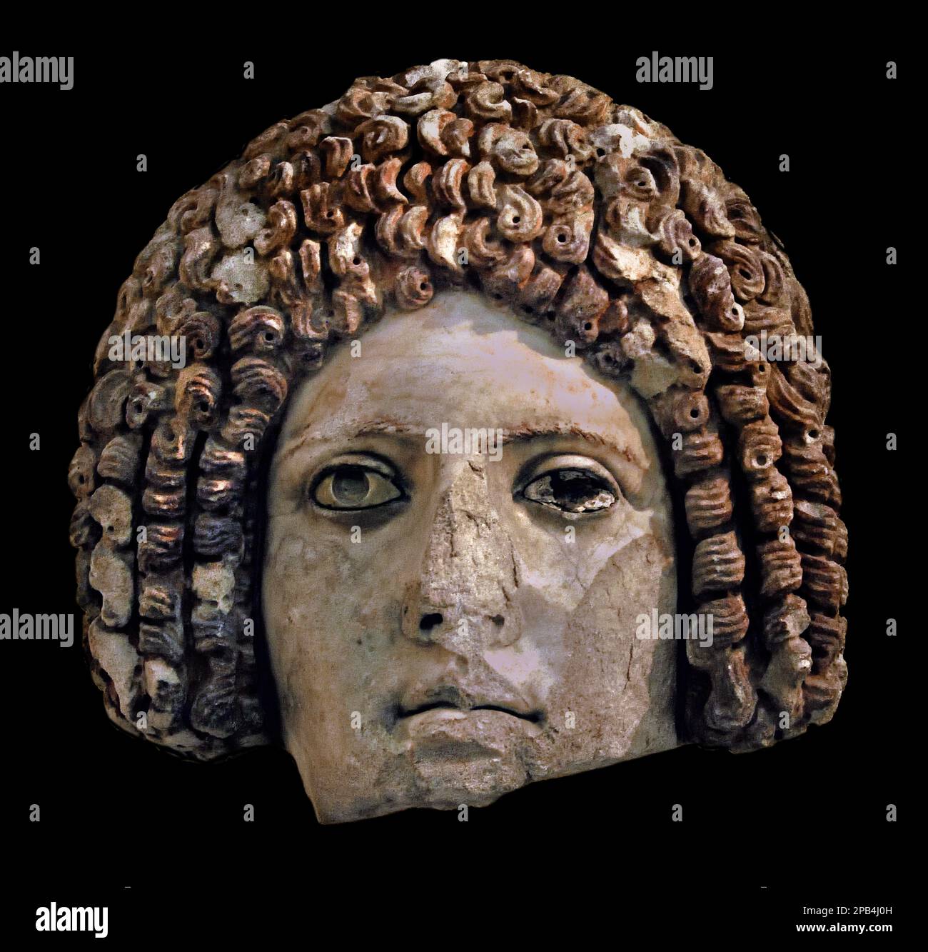 Female portrait head in the form of a mask. Pentelic marble. 1st cent ...